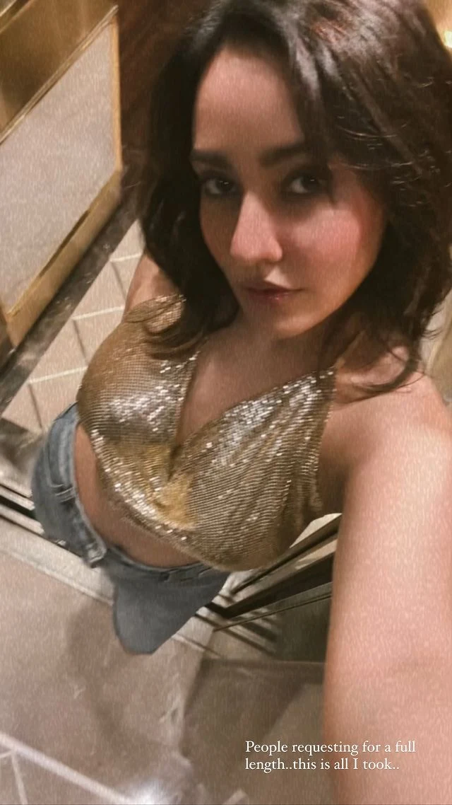 Neha Sharma in cleavage baring golden skimpy top turns the heat up - see now. - SpideyPosts